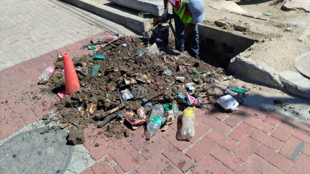 Illegal Dumping in Stormwater Infrastructure leads to flooding and road ...